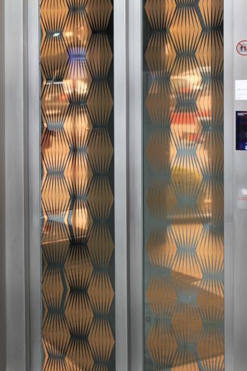 New, glossy metal effect film in copper - Sign Update